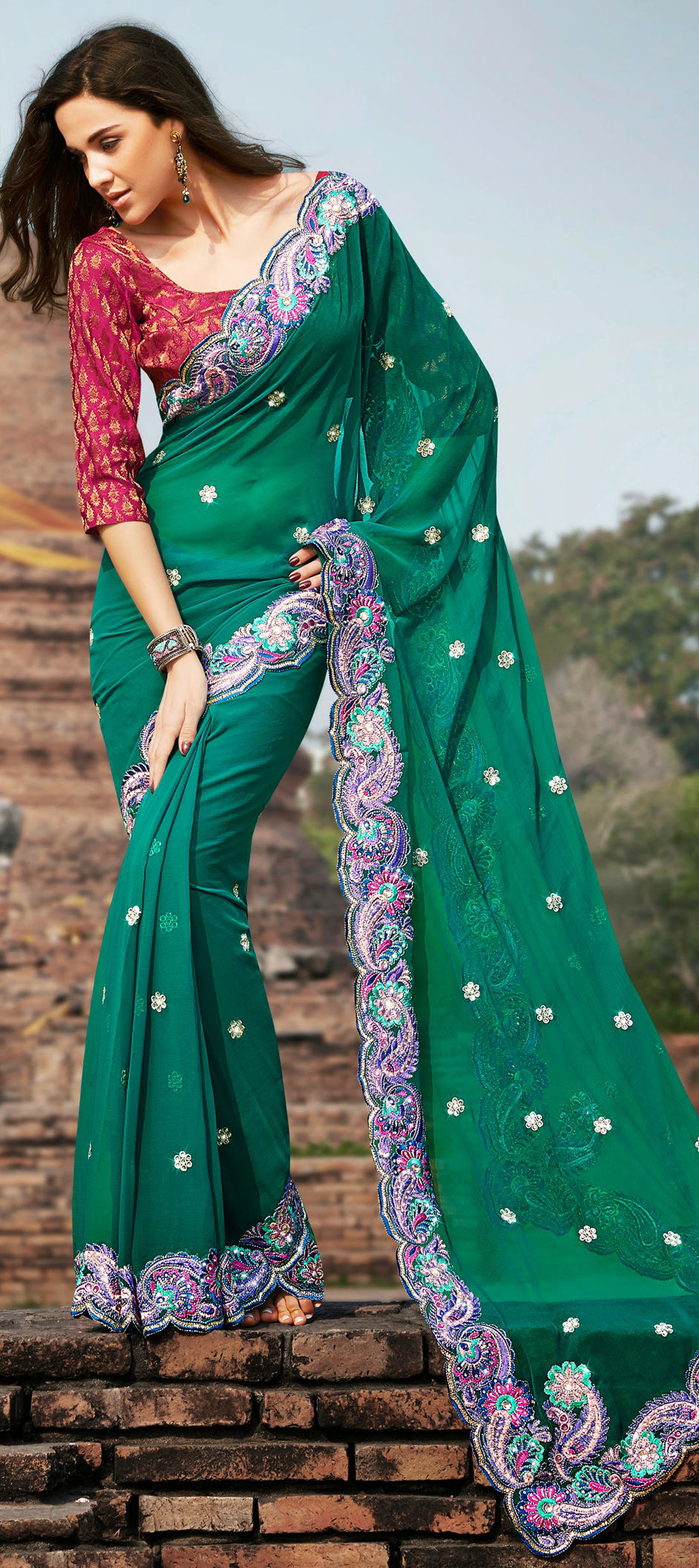 133660: Green color family Saree with matching unstitched blouse.